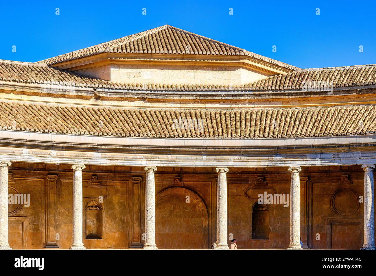 Granada, Spain - September 20, 2024: Tile rooftop and support columns ...
