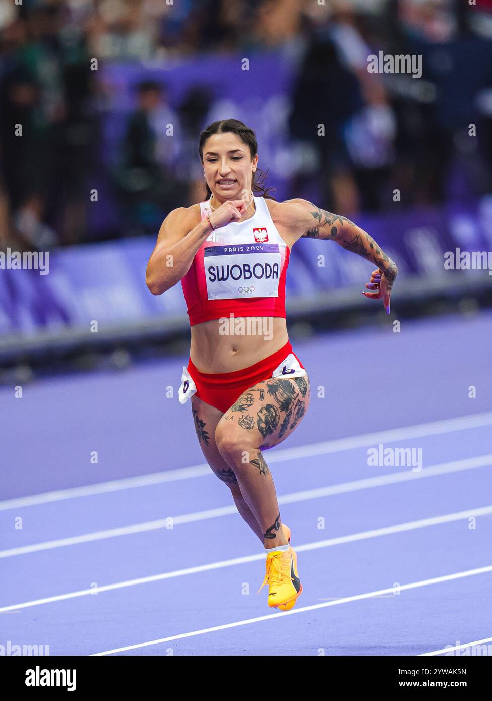 Ewa Swoboda participating in the 100 meters at the Paris 2024 Olympic ...