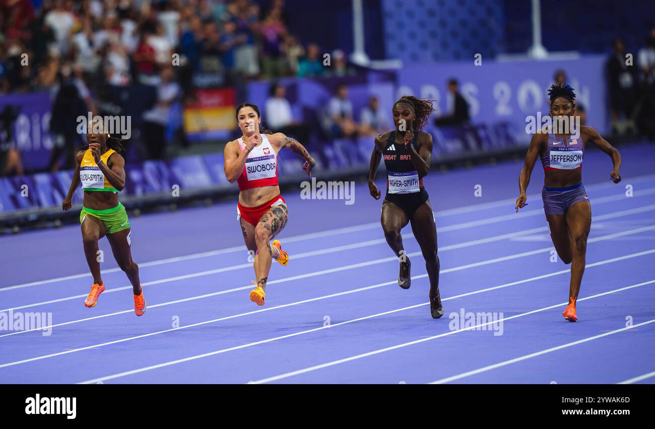 Ewa Swoboda participating in the 100 meters relay at the Paris 2024 ...