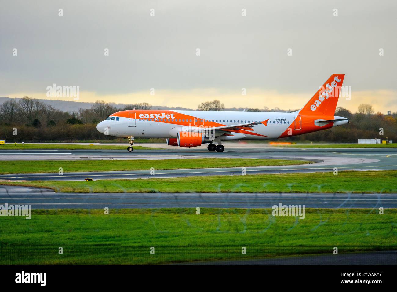An Easyjet plane on runway at Manchester Airport Stock Photo - Alamy