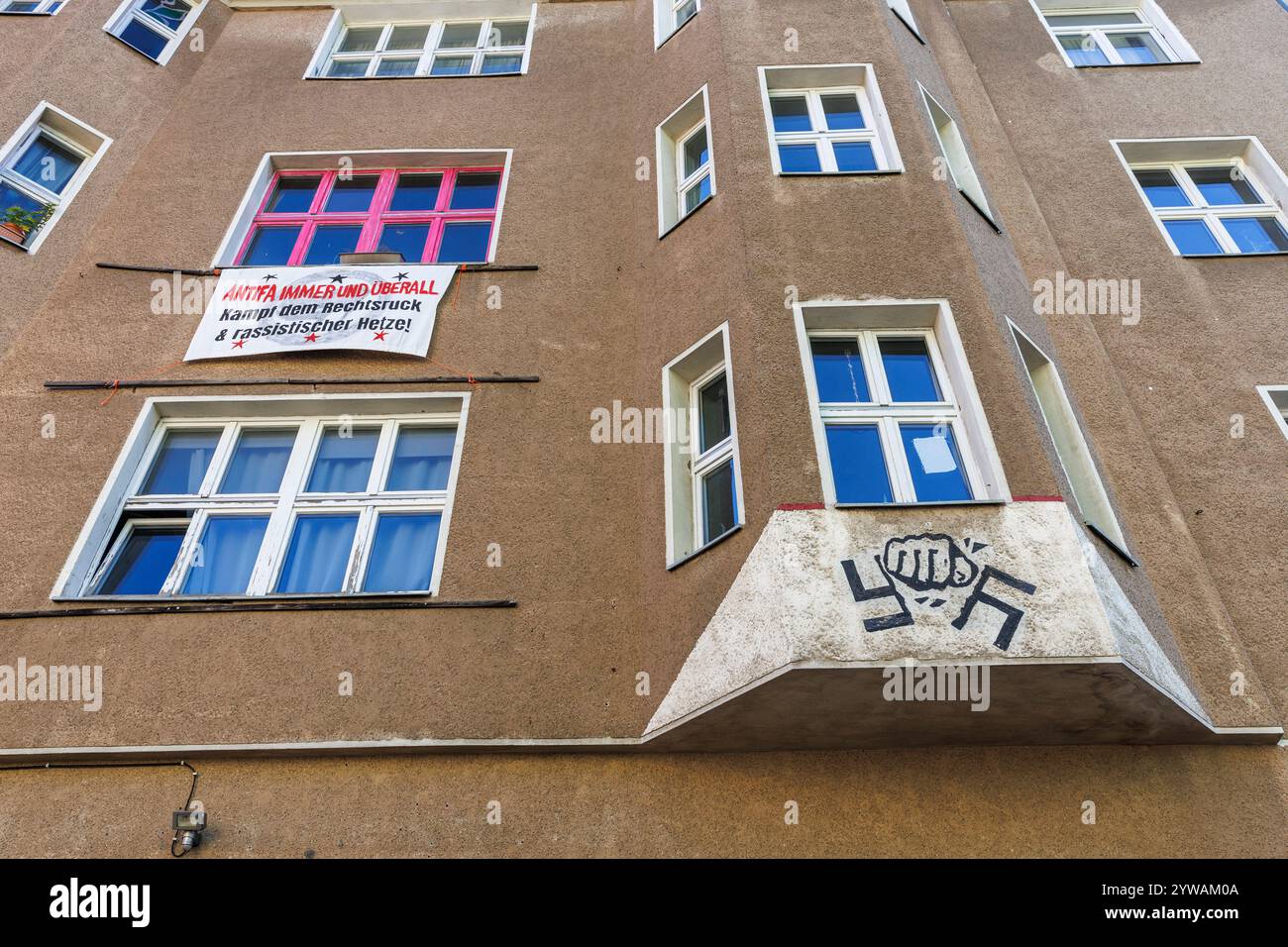 antifa banner and graffiti on a house on Ludolf-Camphausen street, it ...