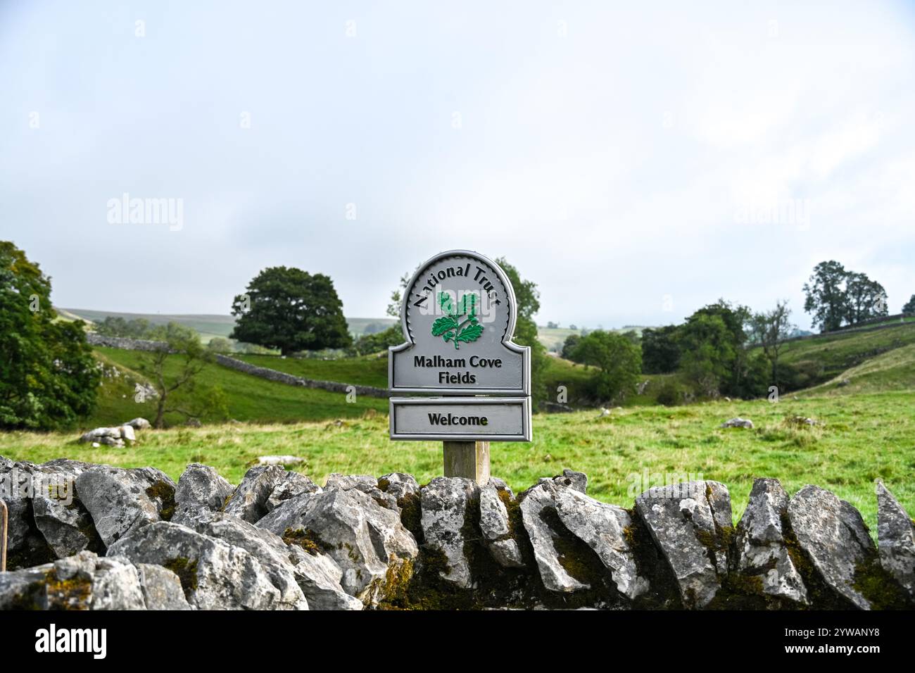 Malham Cove Fields sign and footpaths wiith camping Malham North ...