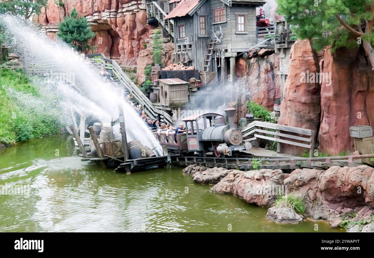 Big Thunder Mountain Railroad, mine train roller coaster passing ...