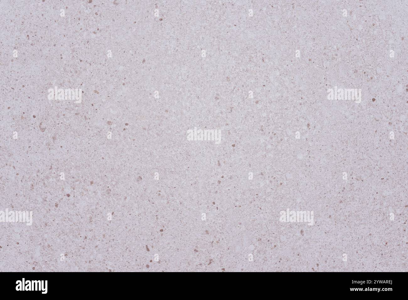 A white background with a few small, scattered dots. The background is ...