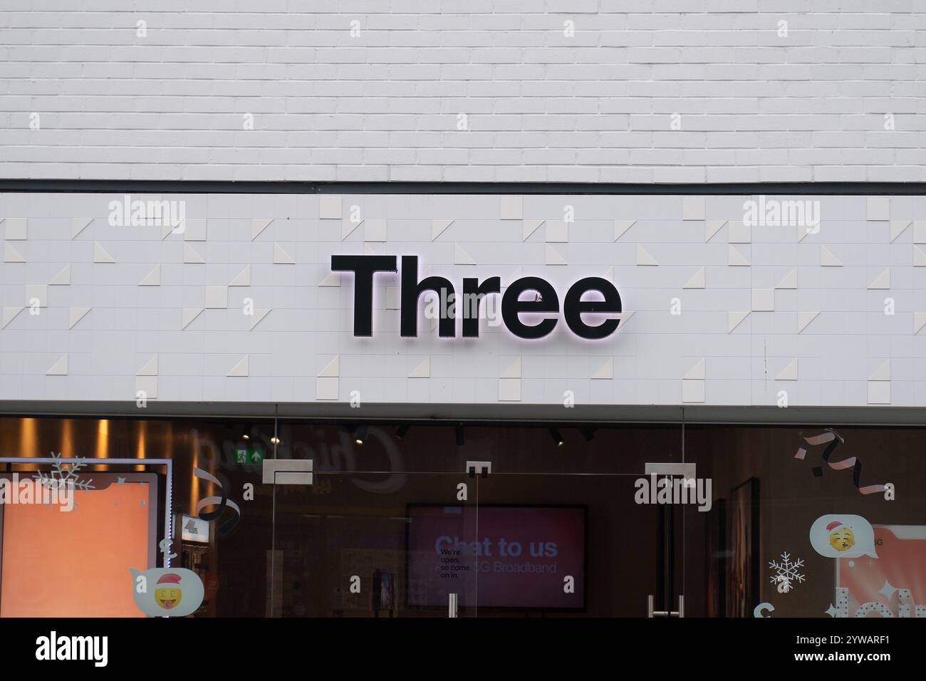 Slough, Berkshire, UK. 6th December, 2024. A Three mobile phone store ...