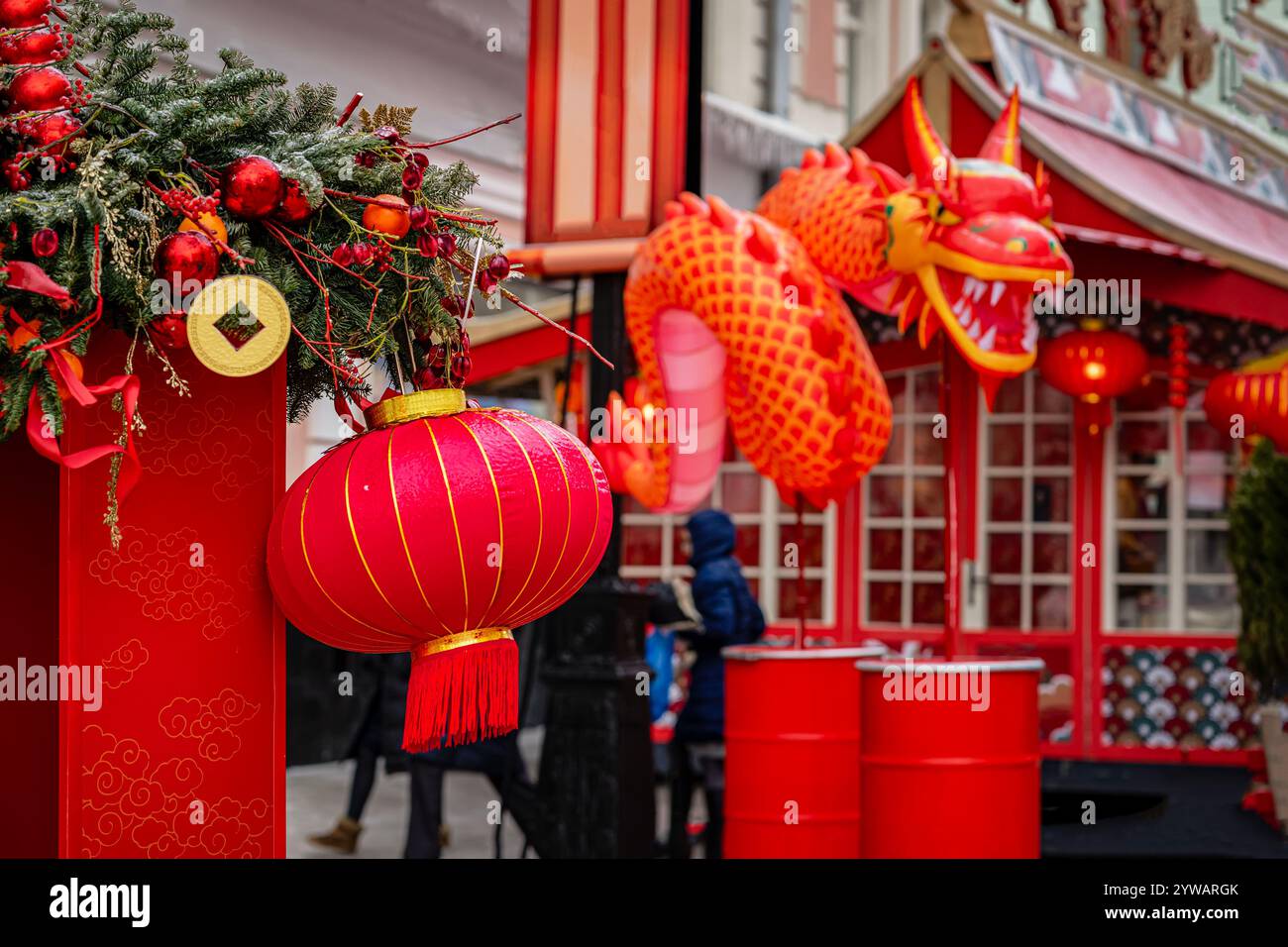 Bright Chinese red lanterns and a dragon decoration, urban festive area ...