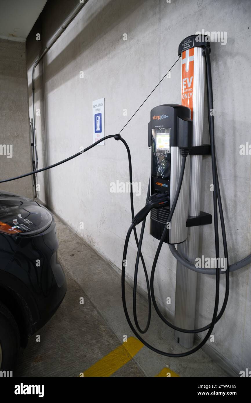 A ChargePoint electric vehicle public charger in a parking structure in ...