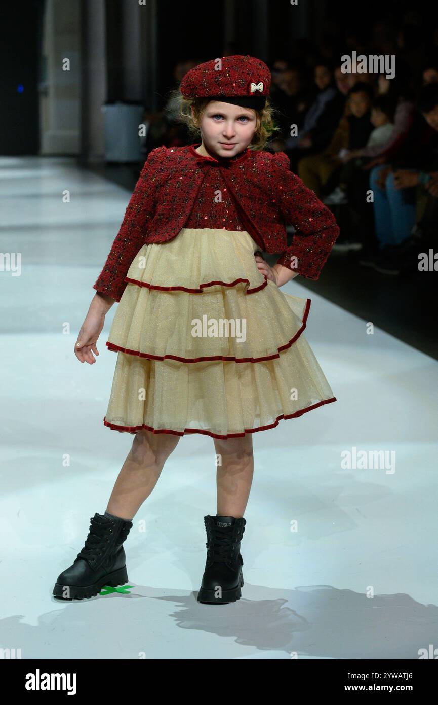 Toronto, ON, Canada - December 7, 2024: A model walks the runway at the ...