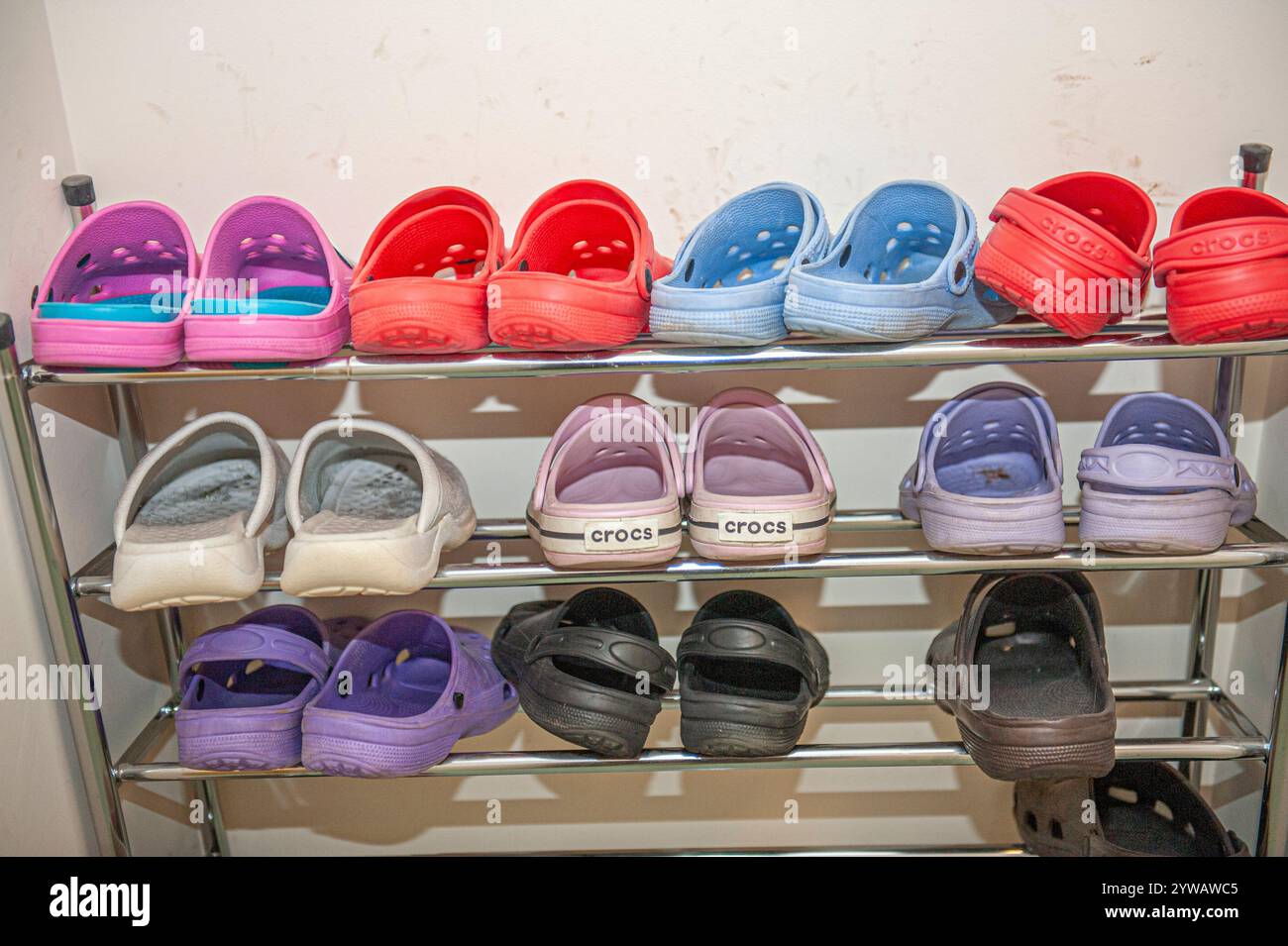 rows of crocs outside operating theatre Stock Photo - Alamy
