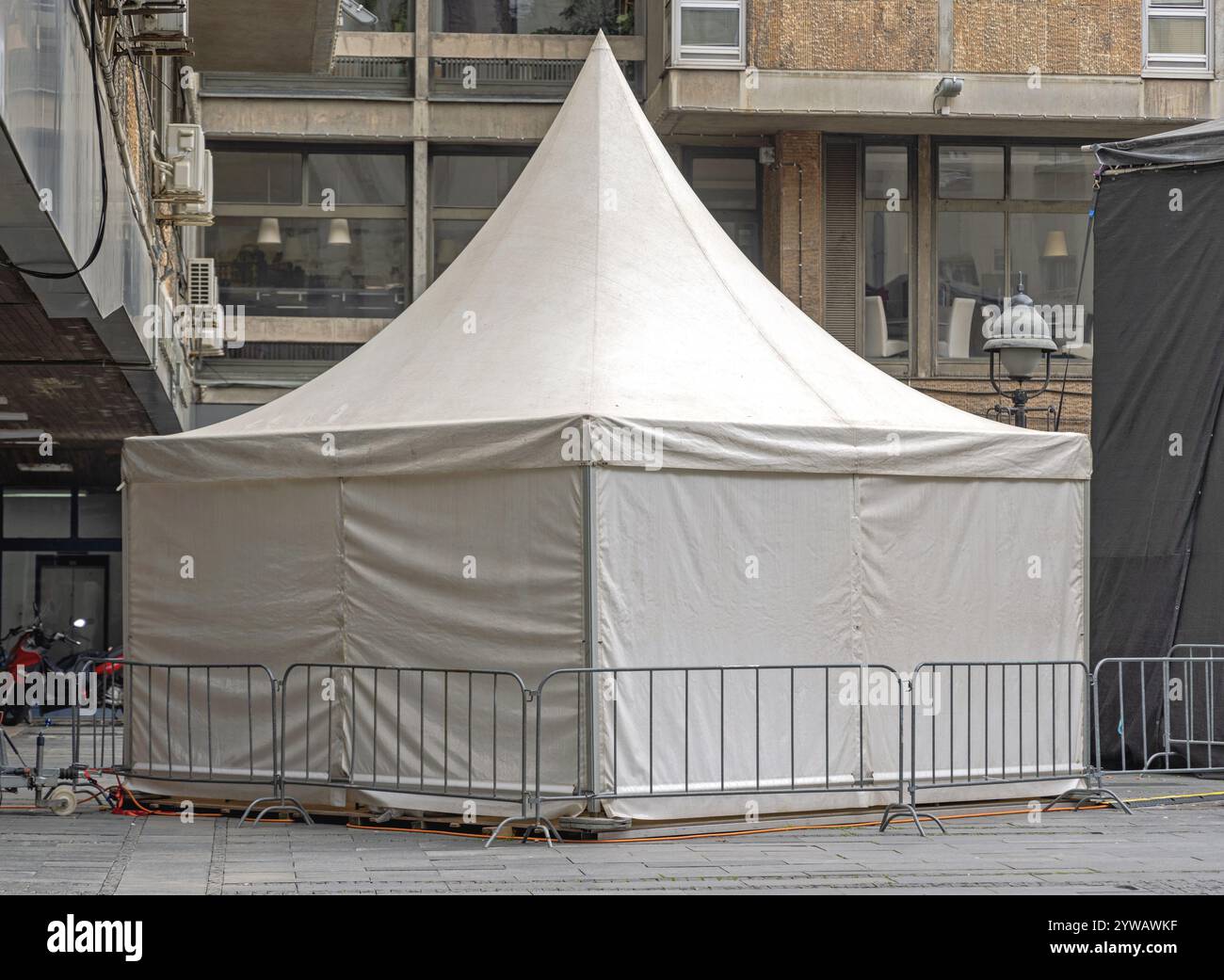 White Canopy Tent Structure With Metal Fence Behind Stage Live Event at ...