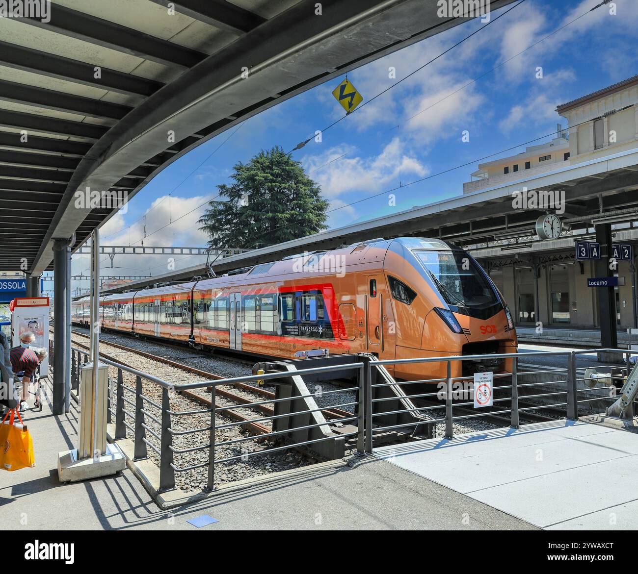 A SOB Traverso eight car passenger articulated train at Locarno railway ...