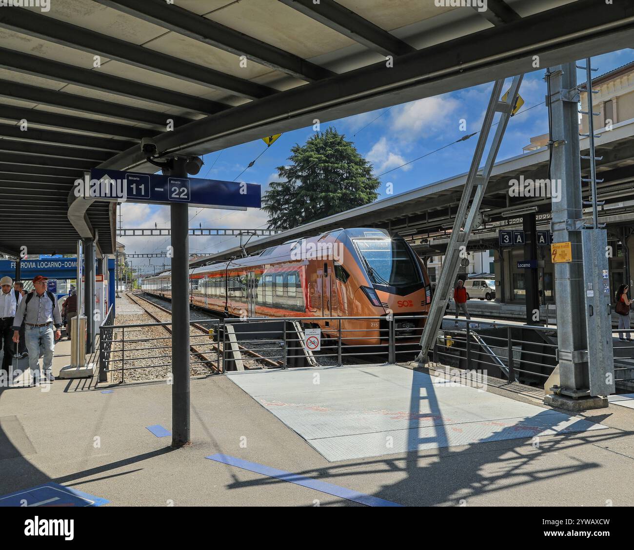 A SOB Traverso eight car passenger articulated train at Locarno railway ...