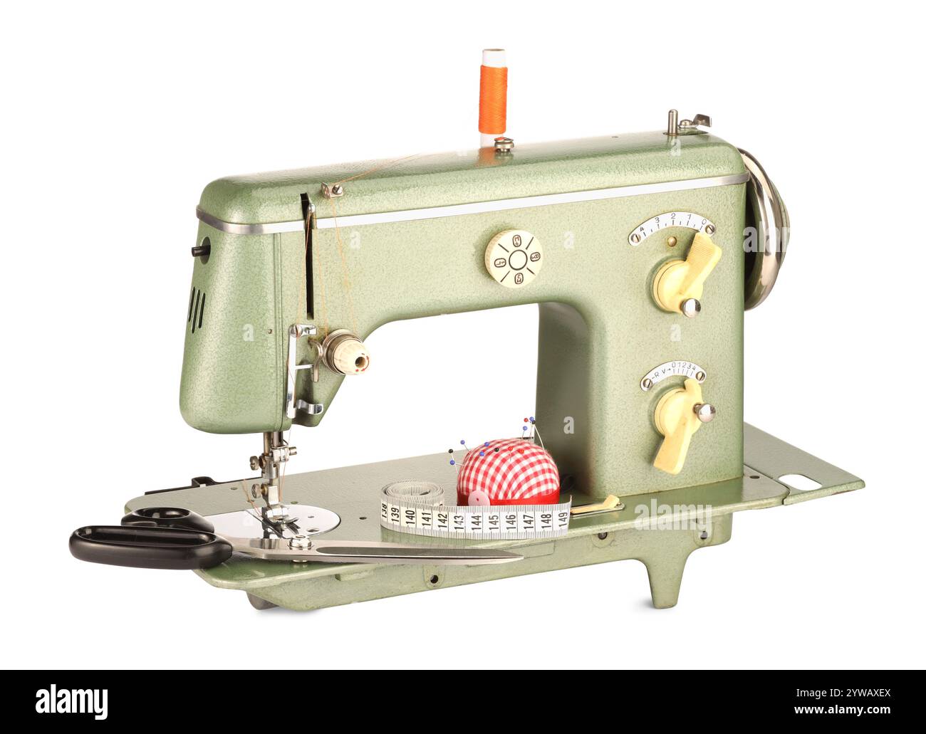 Sewing machine, measuring tape, scissors, pincushion and spool of ...