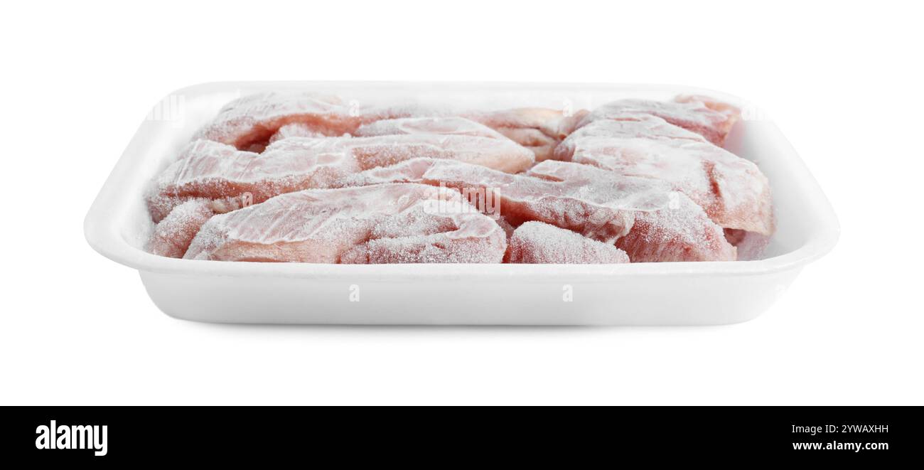 Frozen pieces of chicken fillet in container isolated on white Stock ...