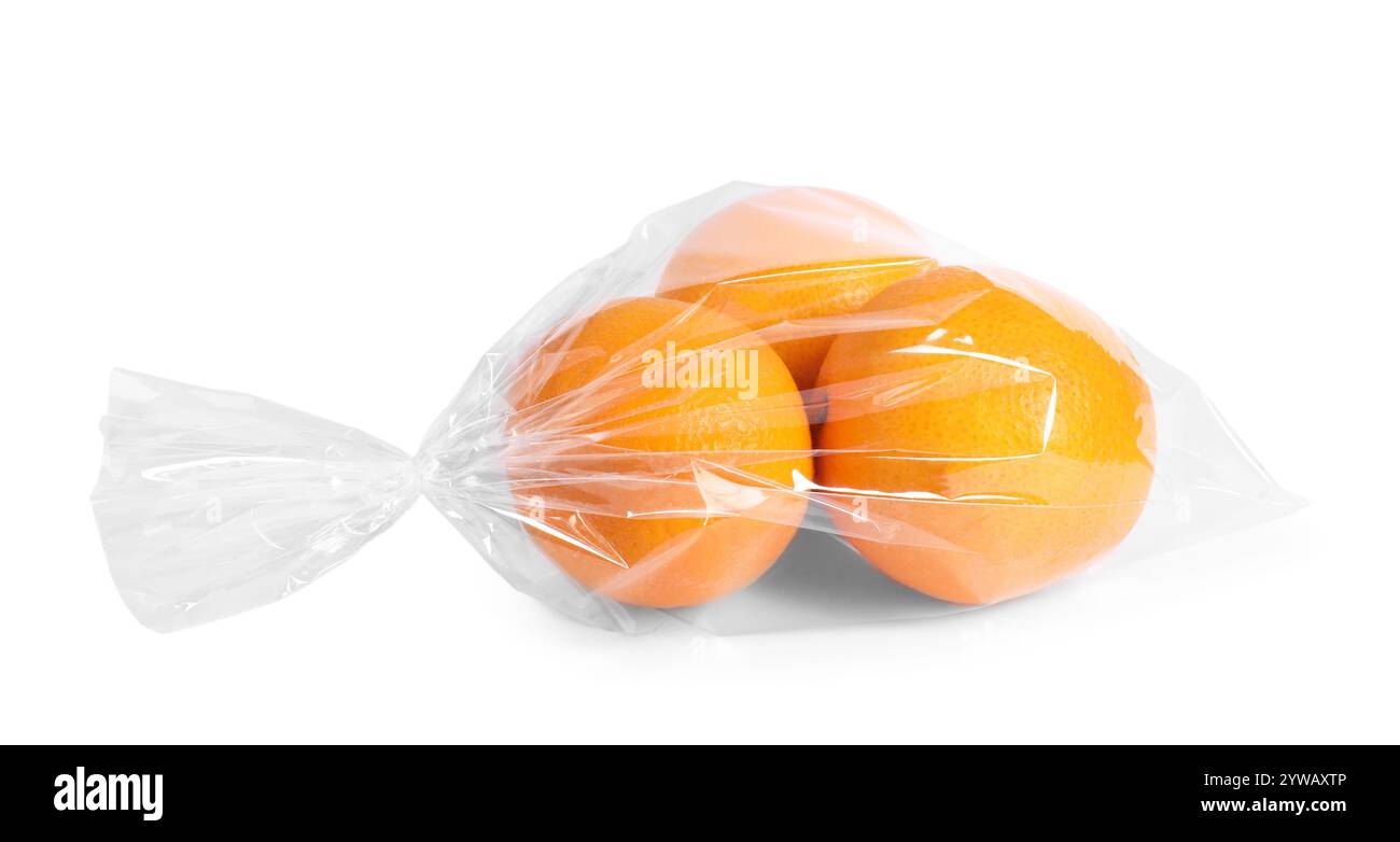 Plastic bag with fresh oranges isolated on white Stock Photo - Alamy