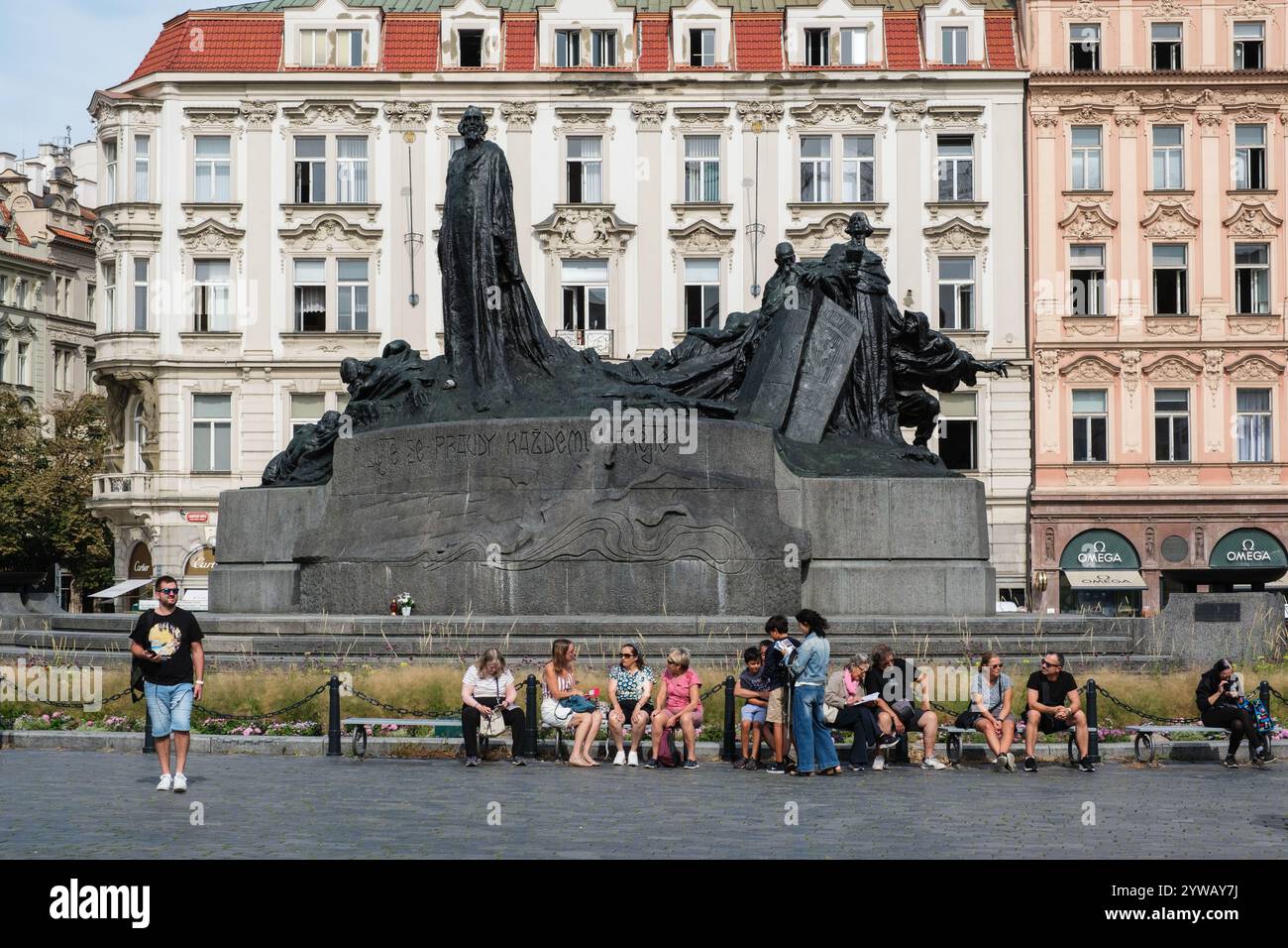 Tourists Resting at Jan Hus Memorial, Old Town Square, Prague, Czech ...