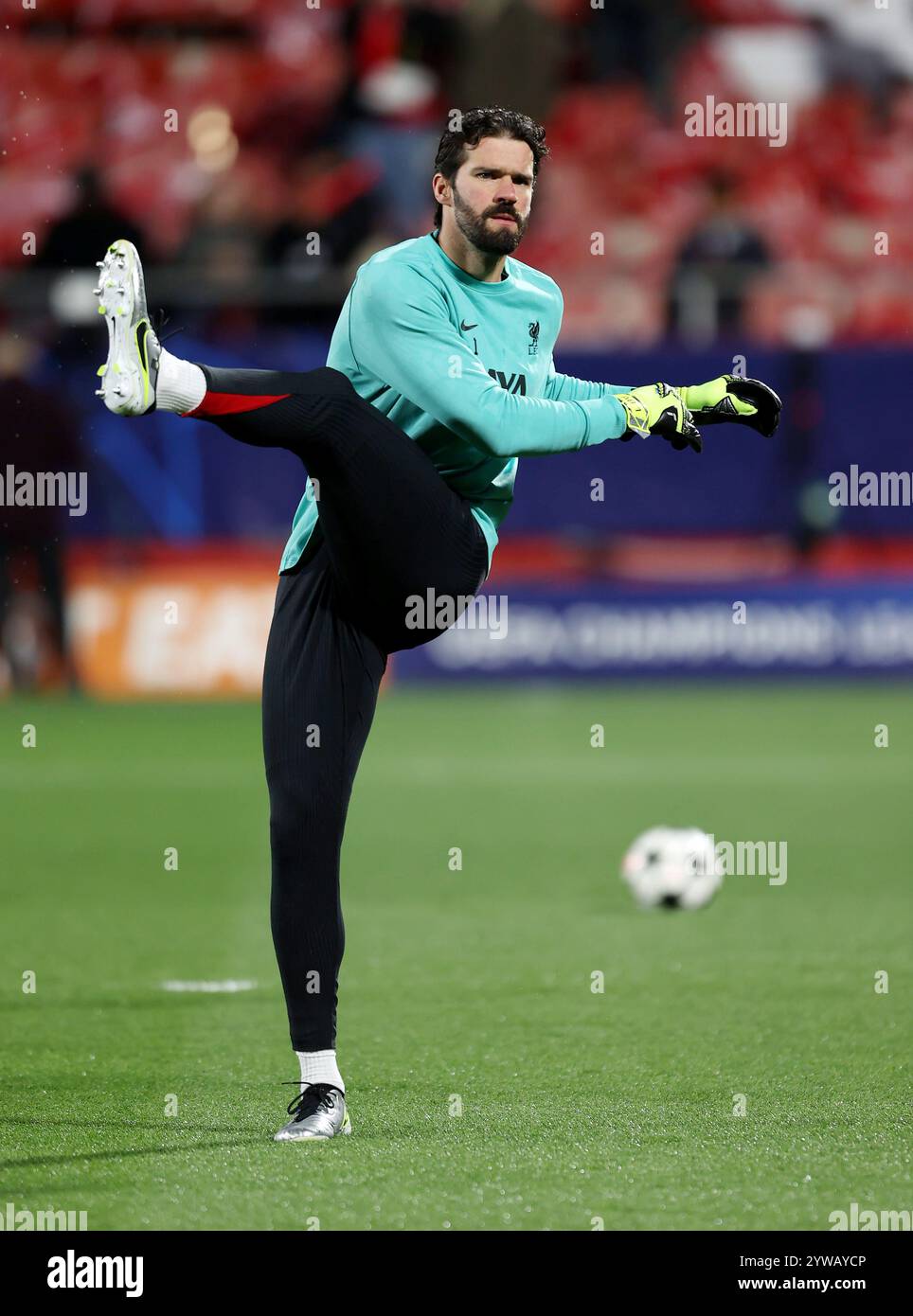 Liverpool goalkeeper Alisson Becker warms up ahead of the UEFA ...
