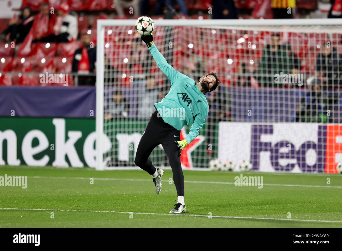 Liverpool goalkeeper Alisson Becker warms up ahead of the UEFA ...