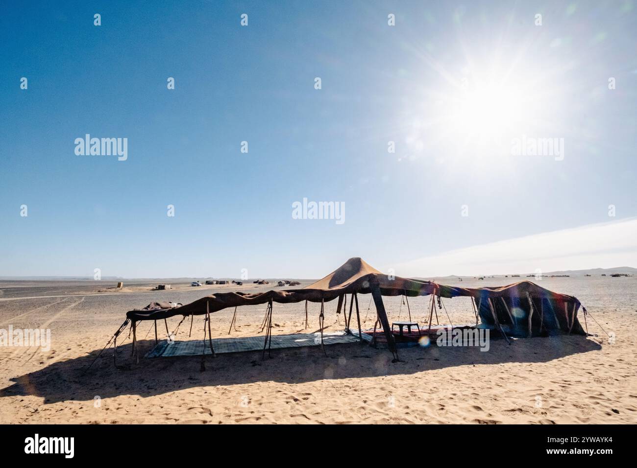 Front Panoramic view of the Moroccan desert and a nomad camp. a typical ...