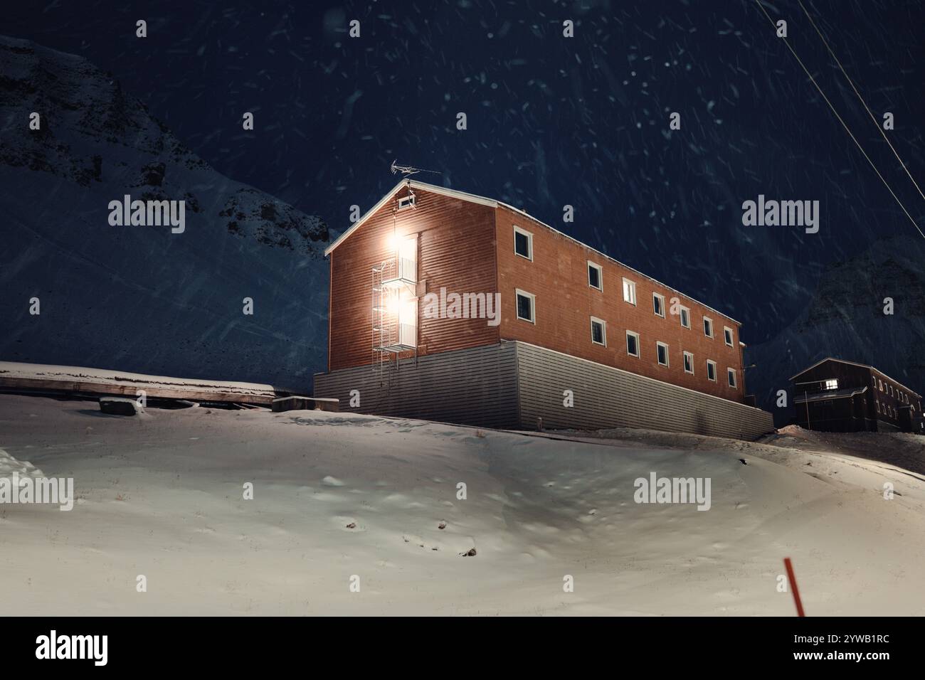 Old wooden miners cabins in Longyearbyen, Svalbard in the polar night ...