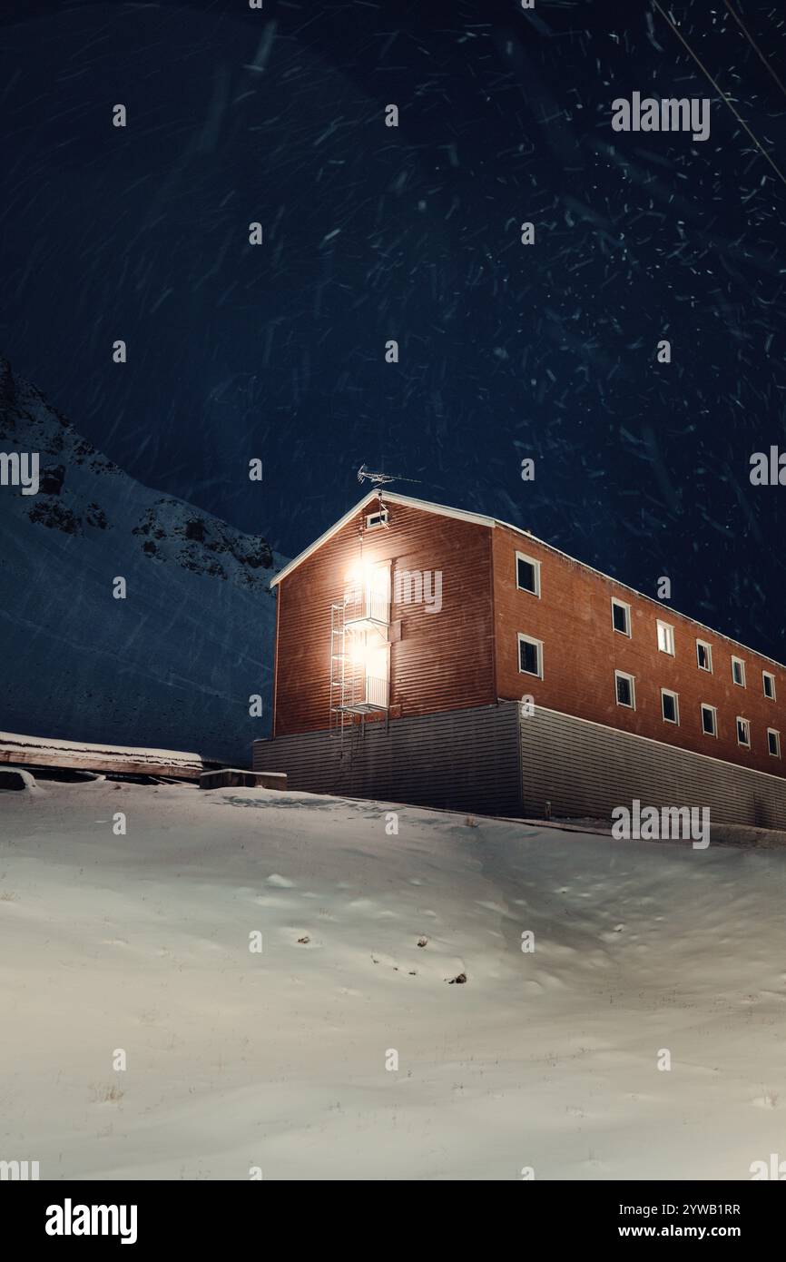 Old miners cabins in snowy polar night in Longyearbyen, Svalbard Stock ...