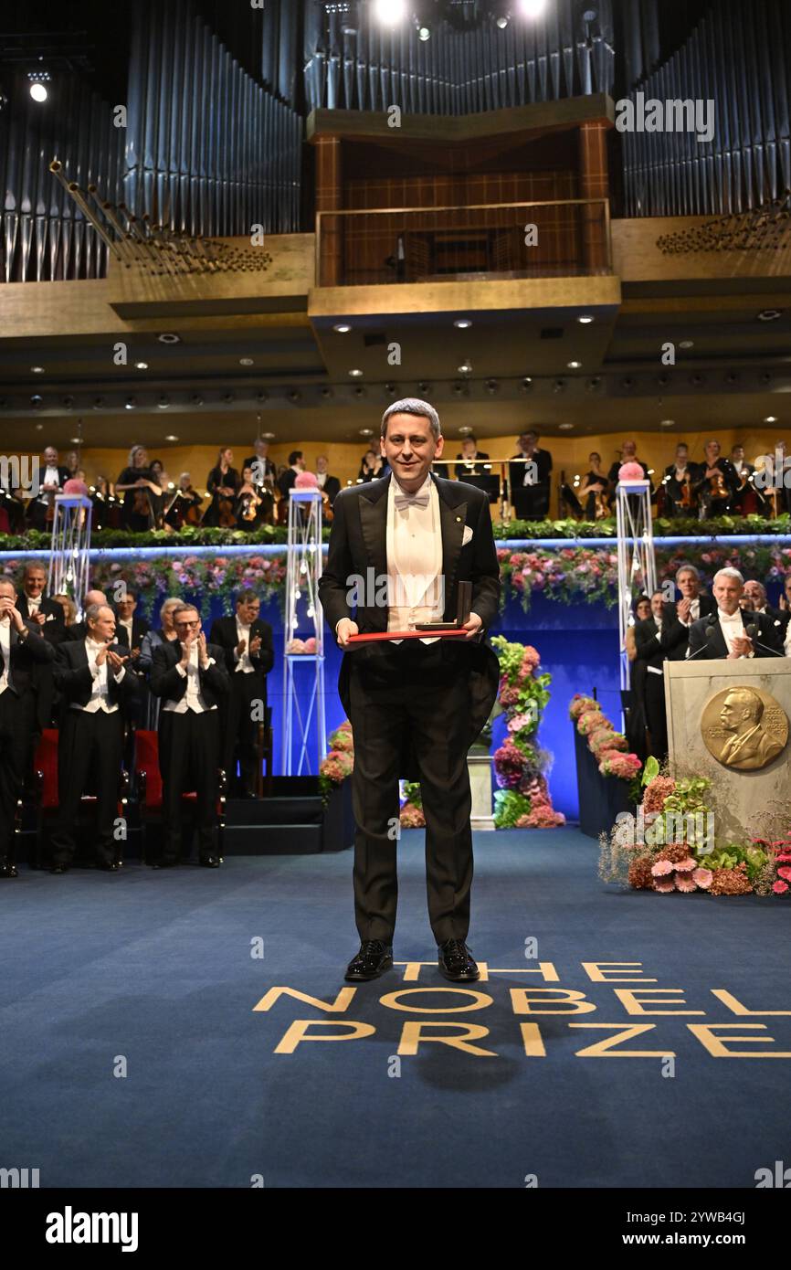 STOCKHOLM, SWEDEN 20241210Nobel laureate in chemistry John Jumper receives his prize at the ...
