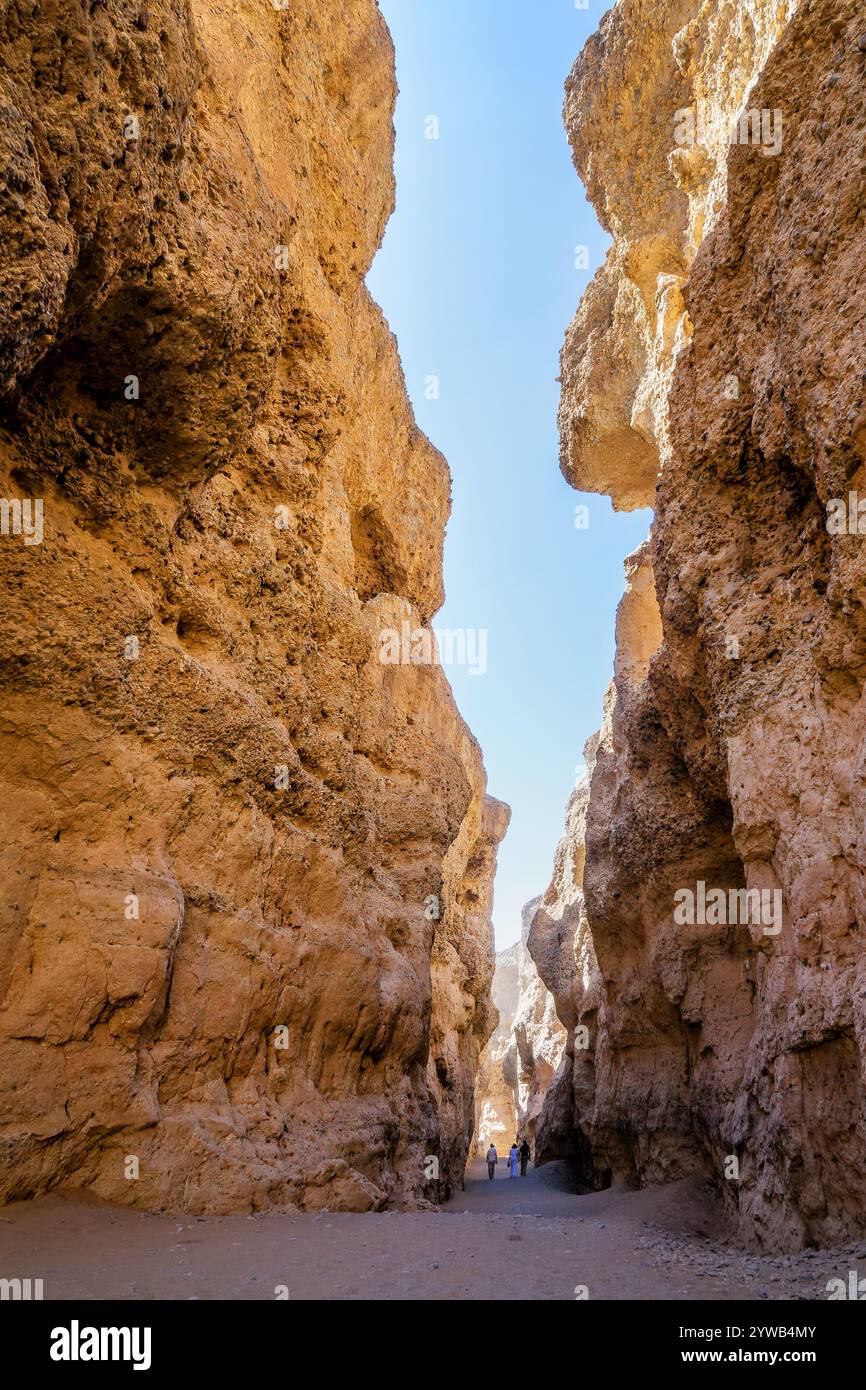 People walking in the canyon of Sesriem, Namib Naukluft national park ...