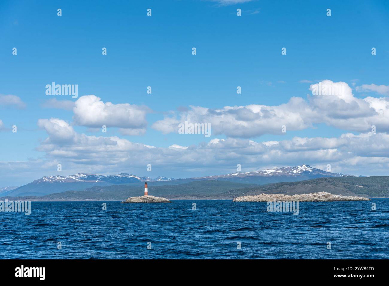 Les Eclaireurs lighthouse in Beagle Channel with distant islands Stock ...