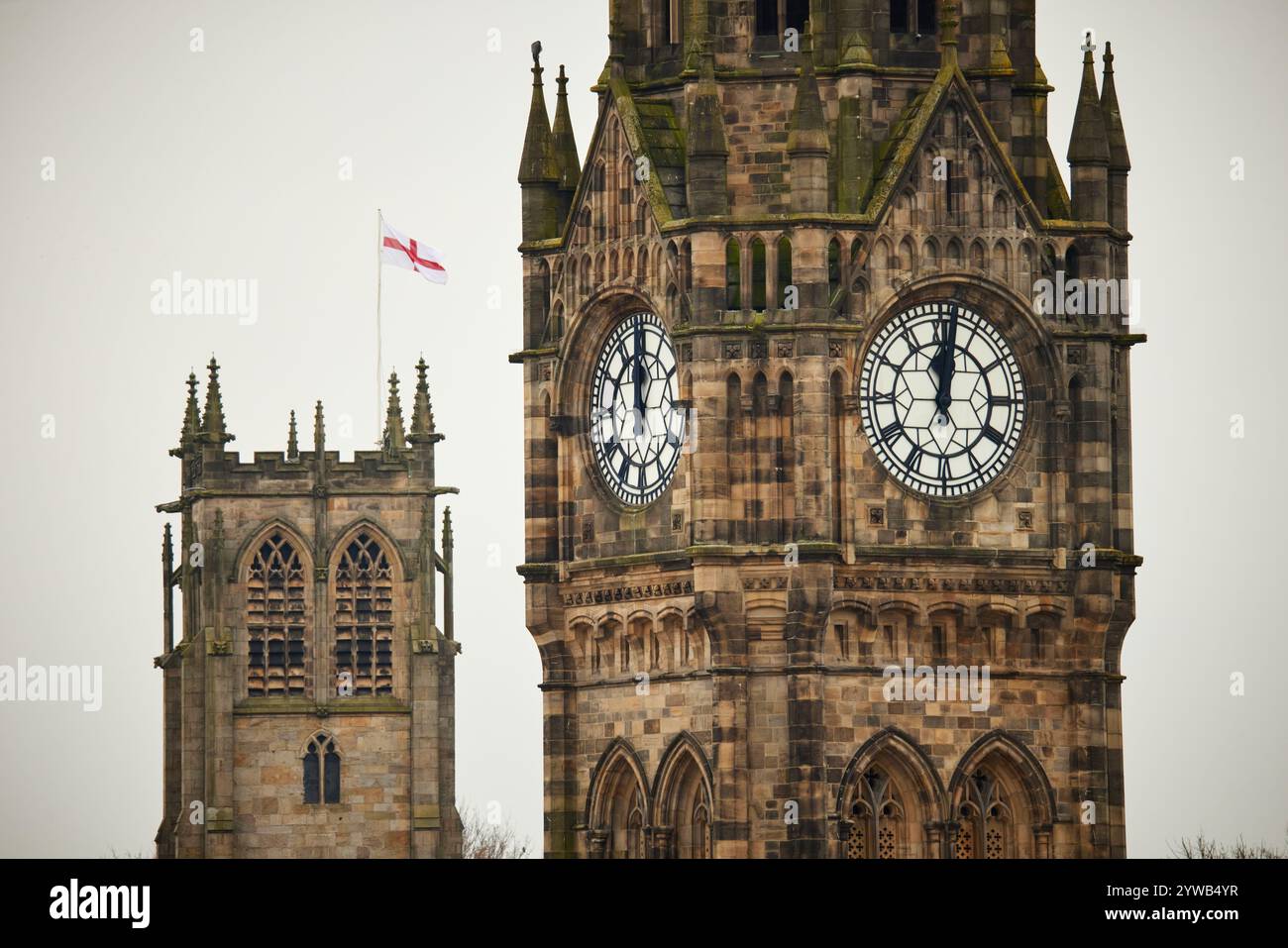 Rochdale town centre, landmark town hall clock with Saint Chad's Parish ...