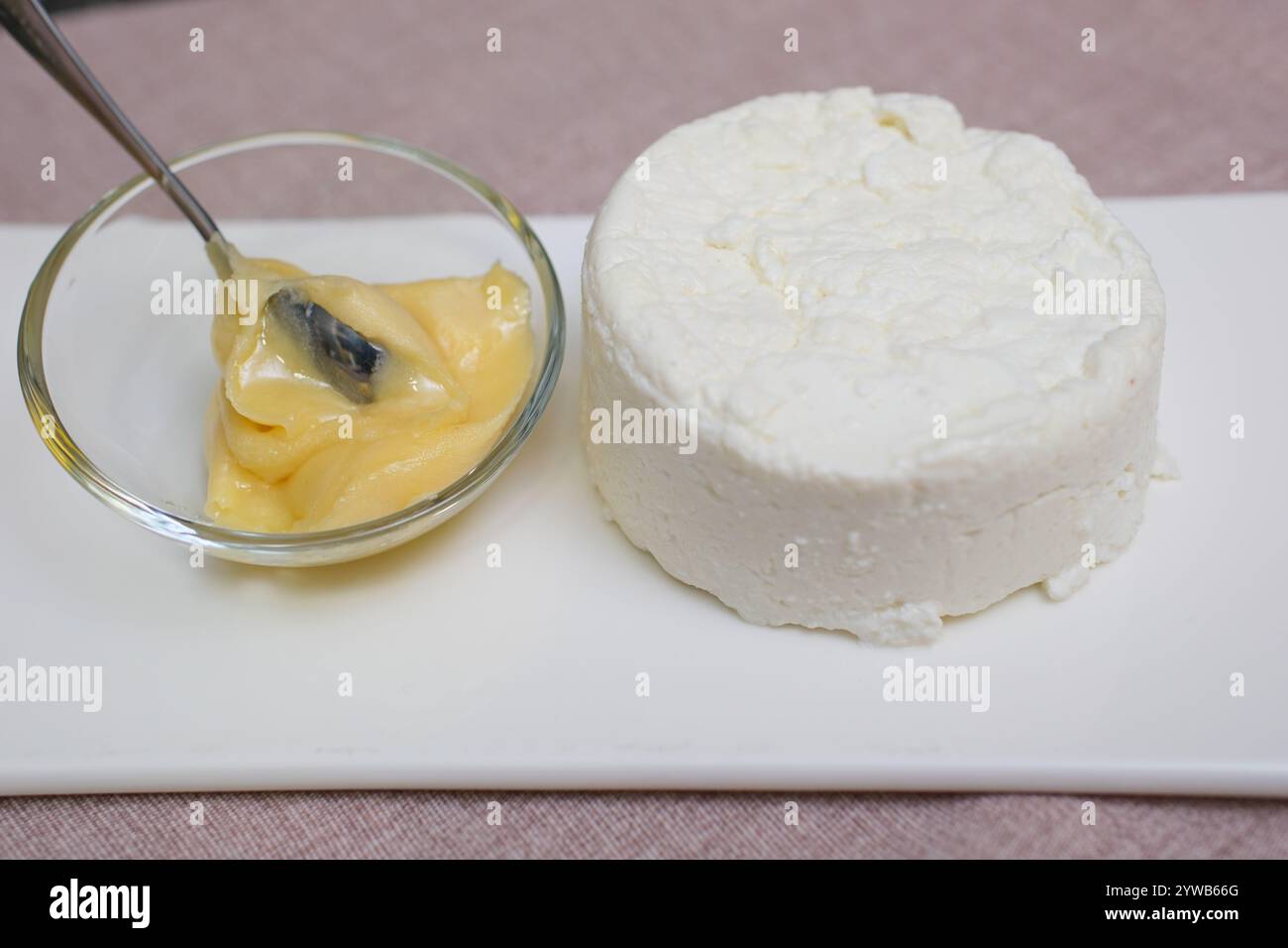 Various types of cheese, blue cheese and brie with honey and nuts ...