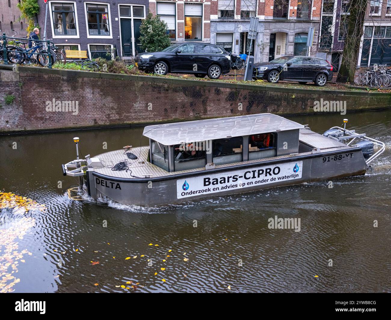 A shallow bottom boat belonging to a water engineering company ...