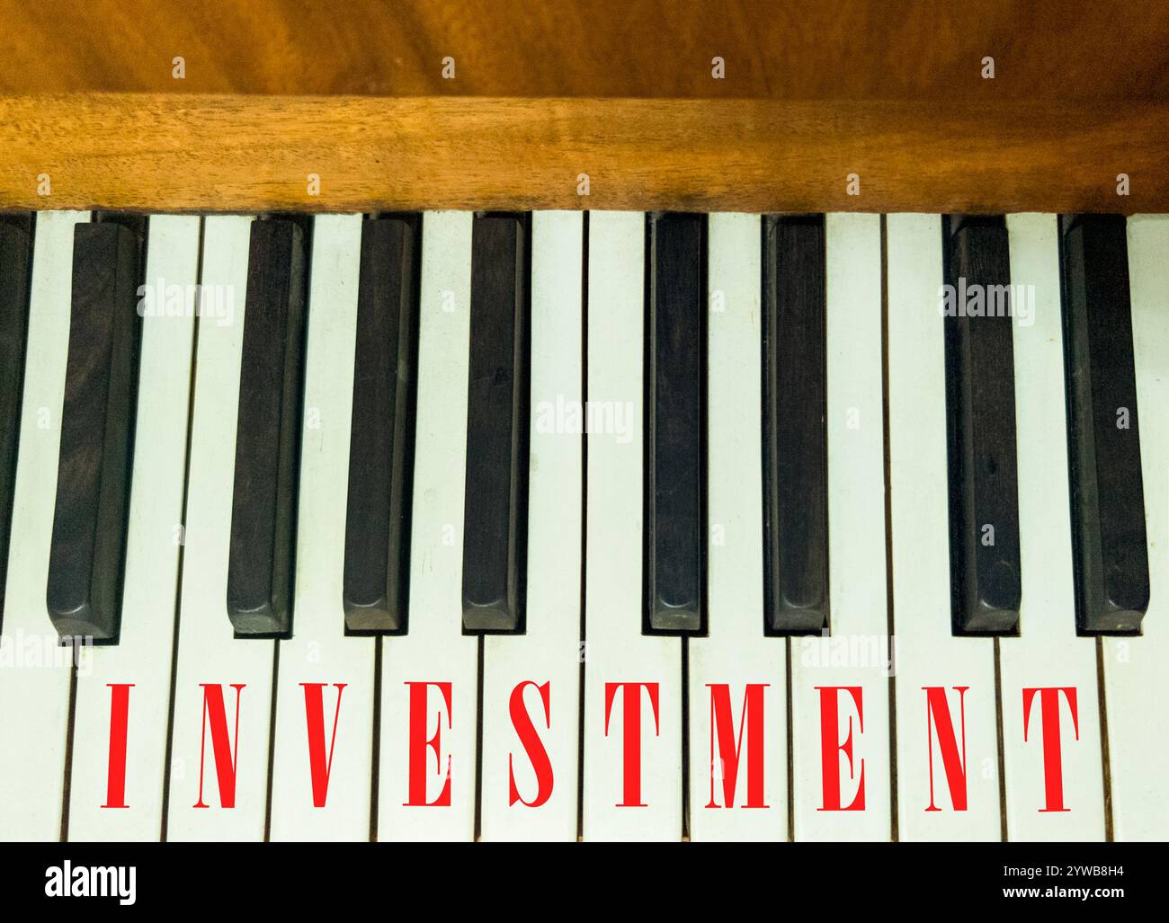 Investment symbol. Concept word Investment on beautiful keys of the old ...