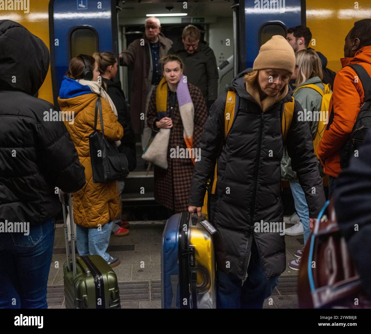 Commuters disembark a morning train November 22, 2024 at Central ...