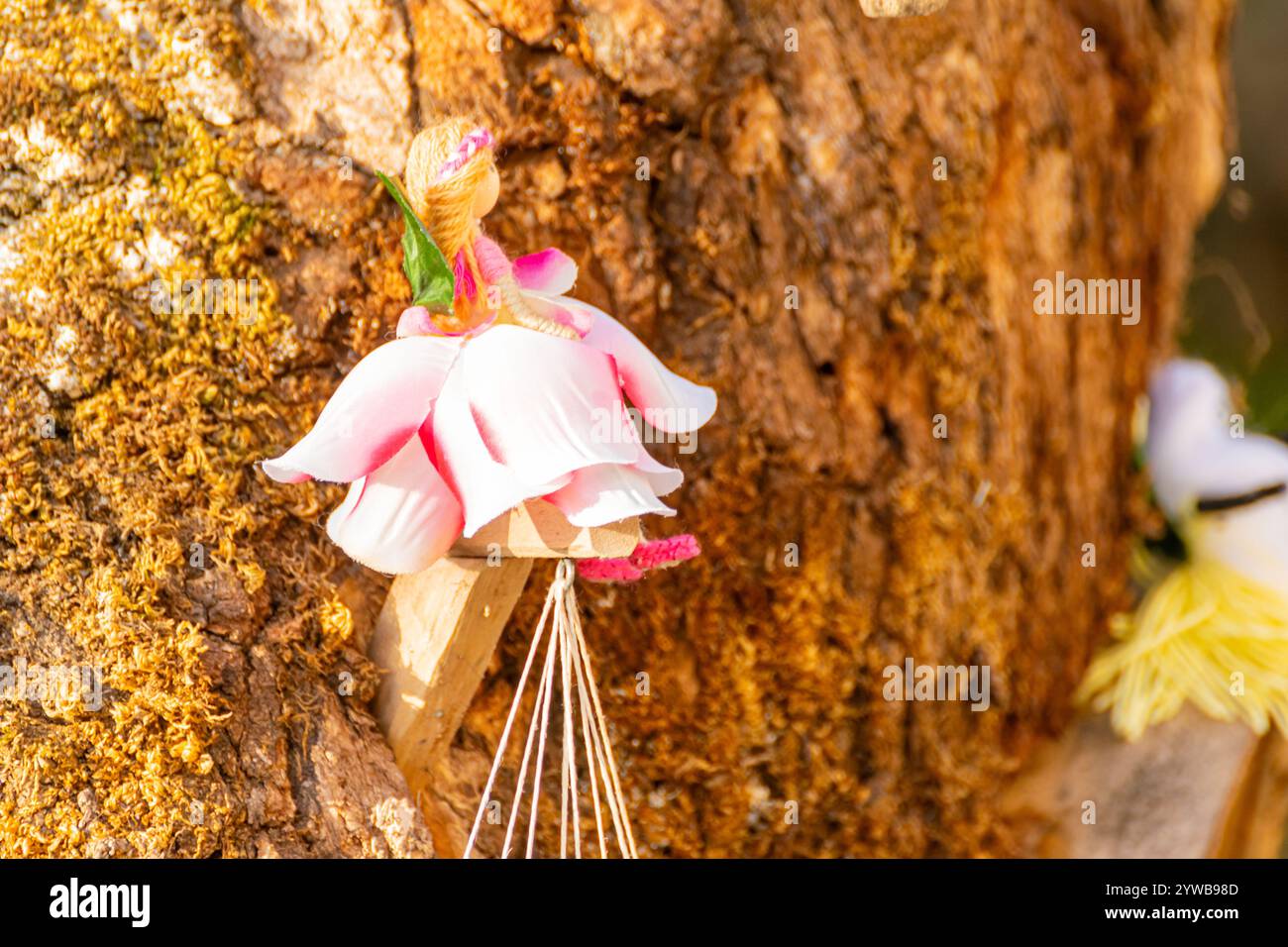 homemade toy fairy sitting on a tree trunk, handmade christmas ...