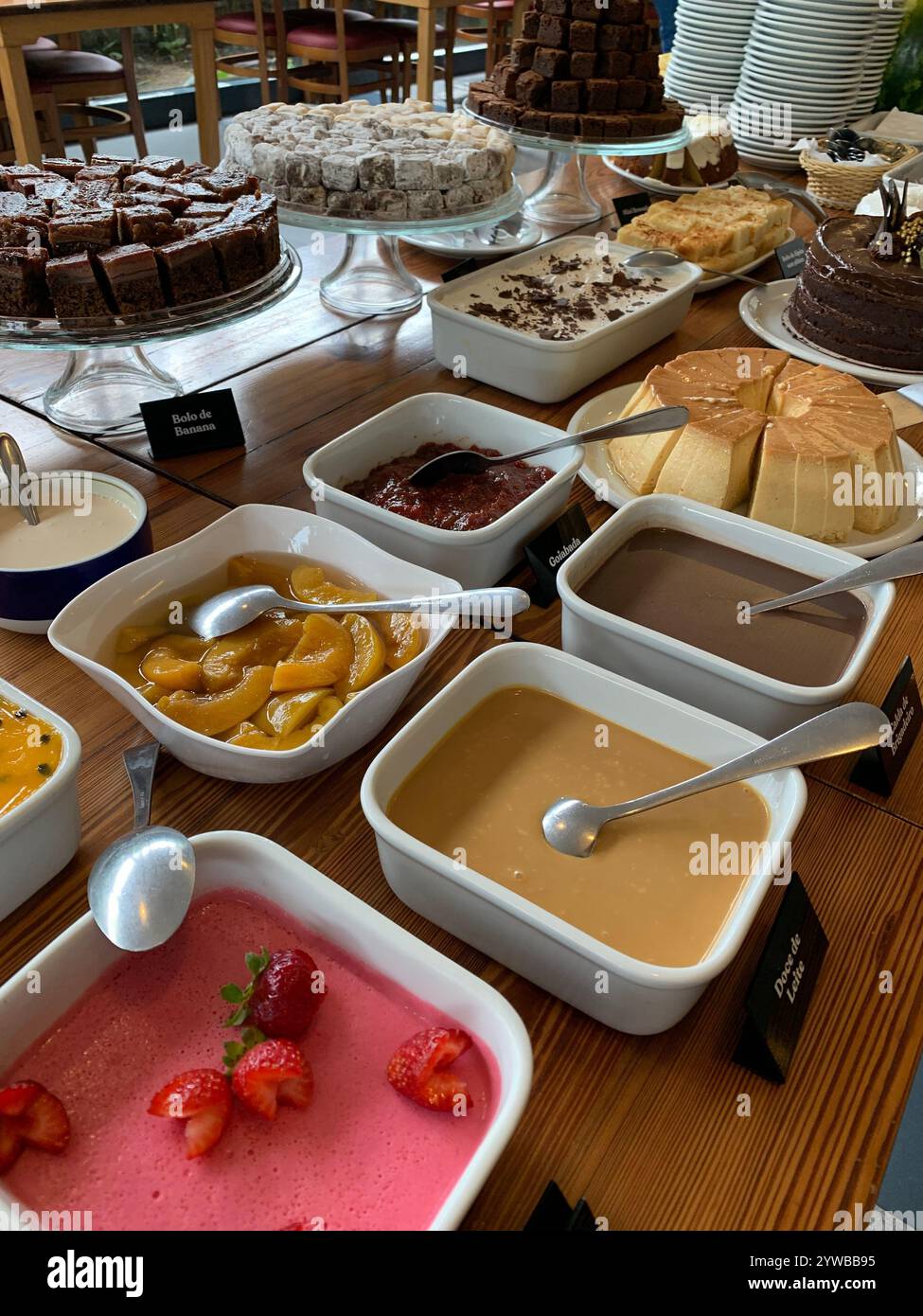 Full dessert table set up with assorted pudim Stock Photo - Alamy