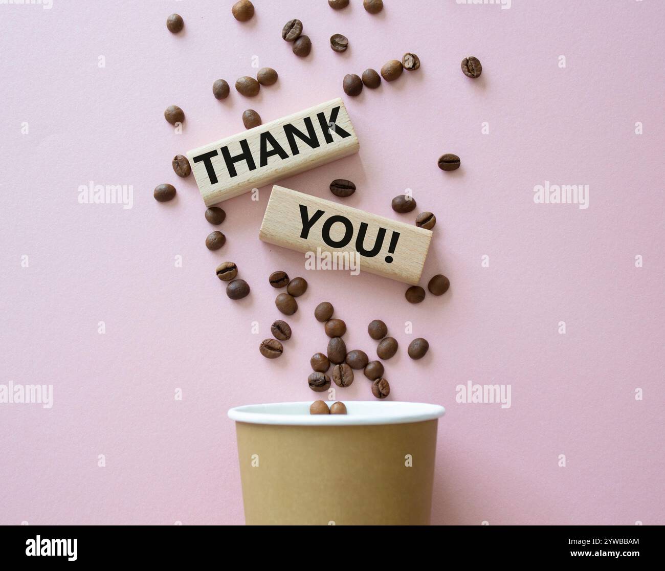 Thank you symbol. Wooden blocks with words Thank you. Beautiful pink ...