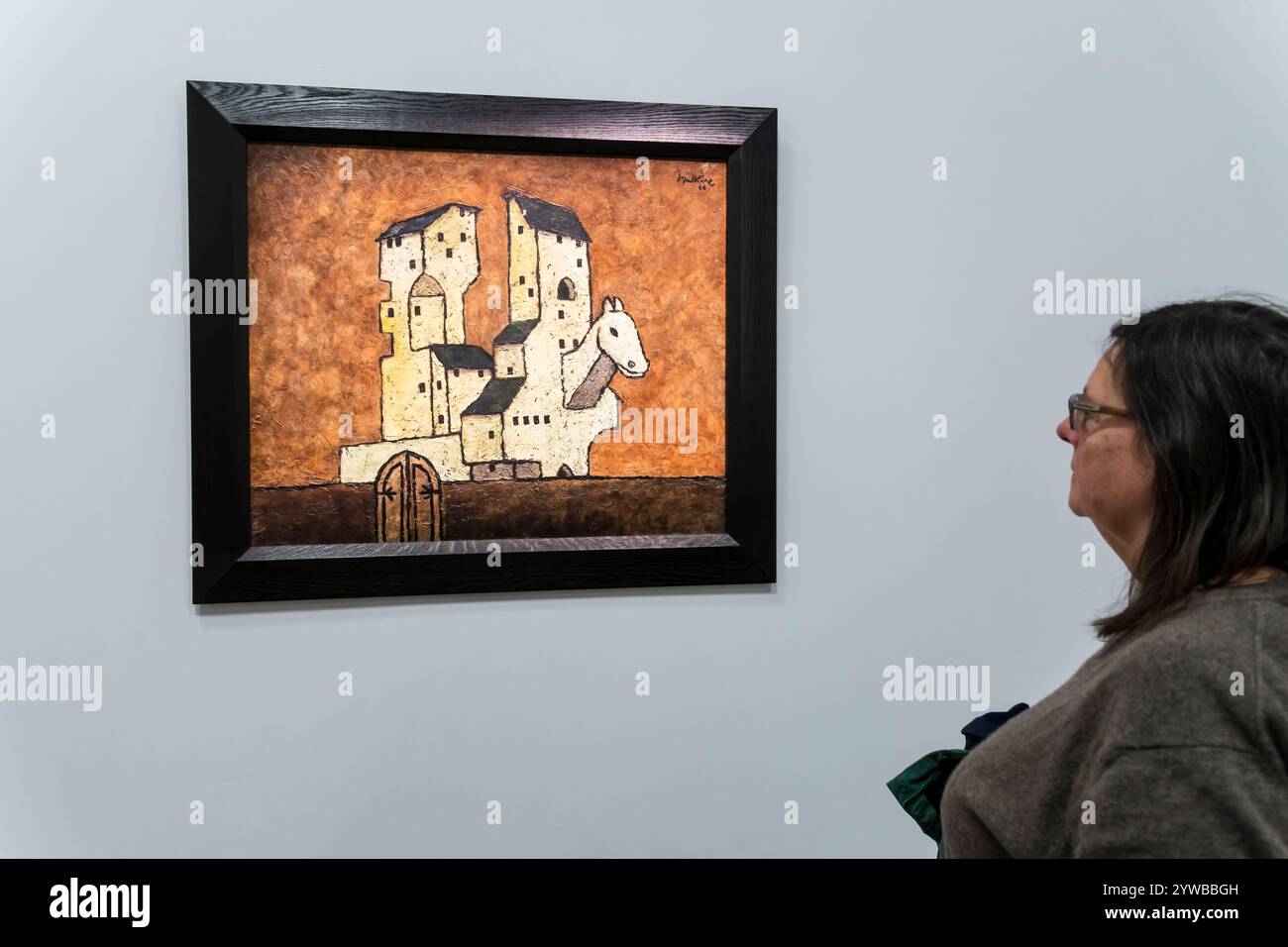 A visitor looking at Demeure de Lewis Carroll or Lewis Carroll's home ...