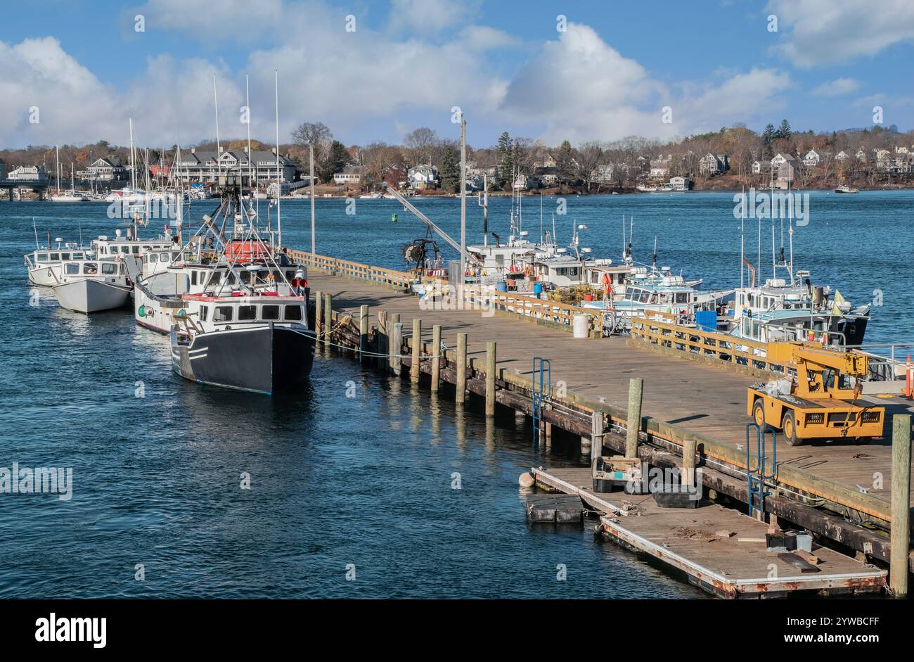 Commercial Fishing Pier: Fishing boats dock at a working pier in ...