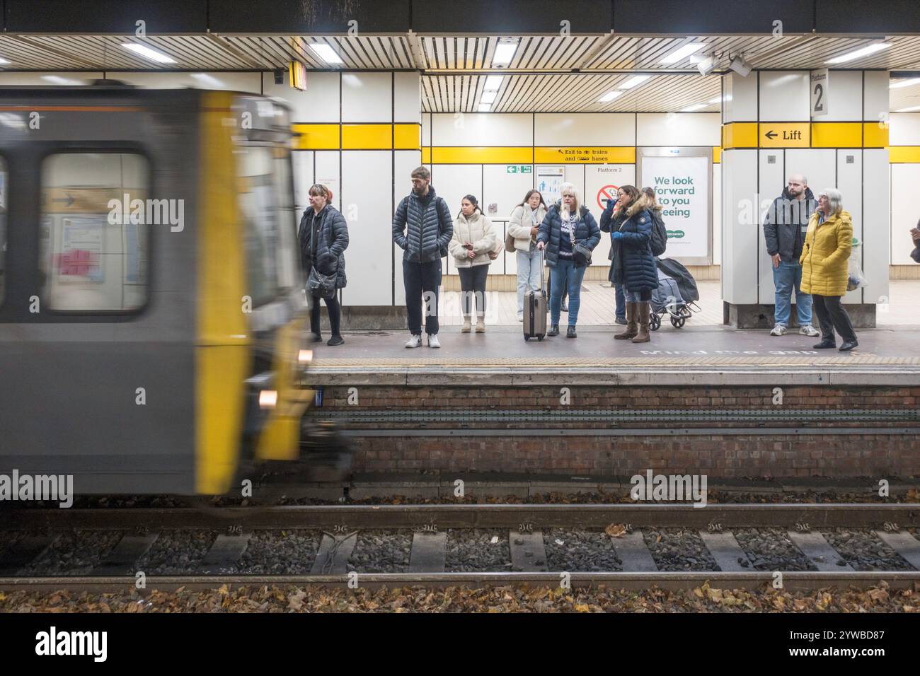 Passengers waiting for a Tyneside Metro train on Heworth station ...