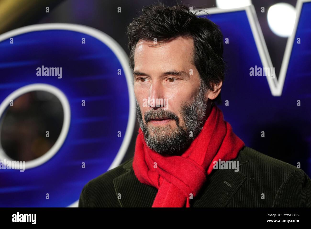Keanu Reeves poses for photographers upon arrival at the premiere of ...