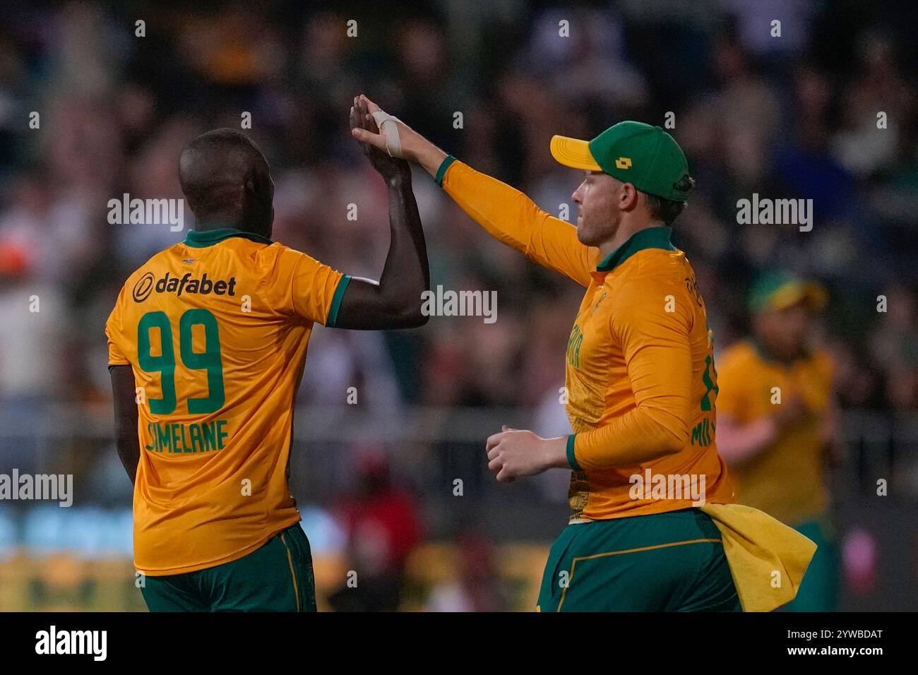 South Africa's Andile Simelane, left, and South Africa's David Miller ...