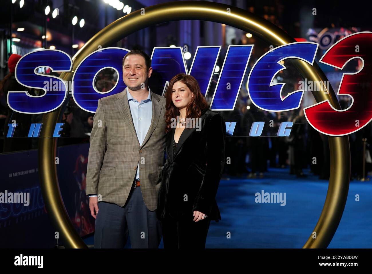 Toby Ascher and guest pose for photographers upon arrival at the ...
