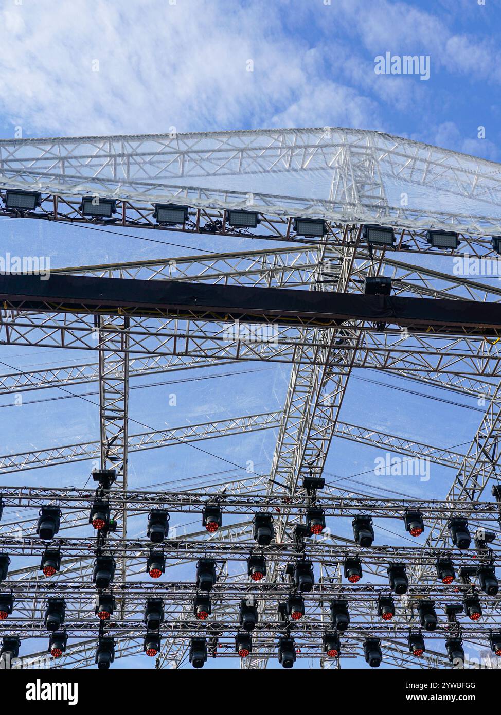 Fragment of metal trusses and lighting elements of a large outdoor ...