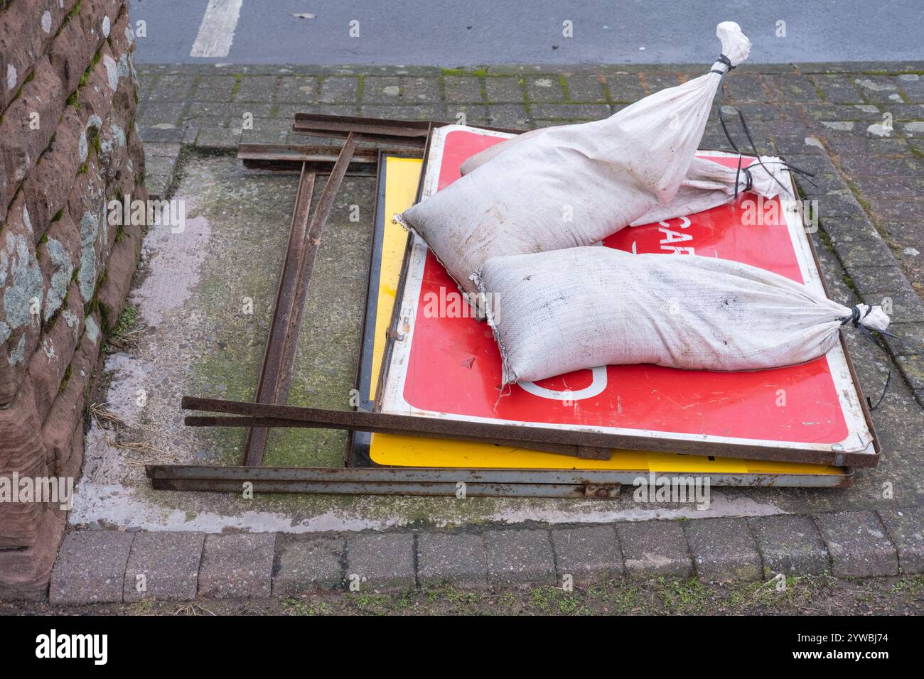 Sandbags lying on top of public information signs during storm Darragh ...
