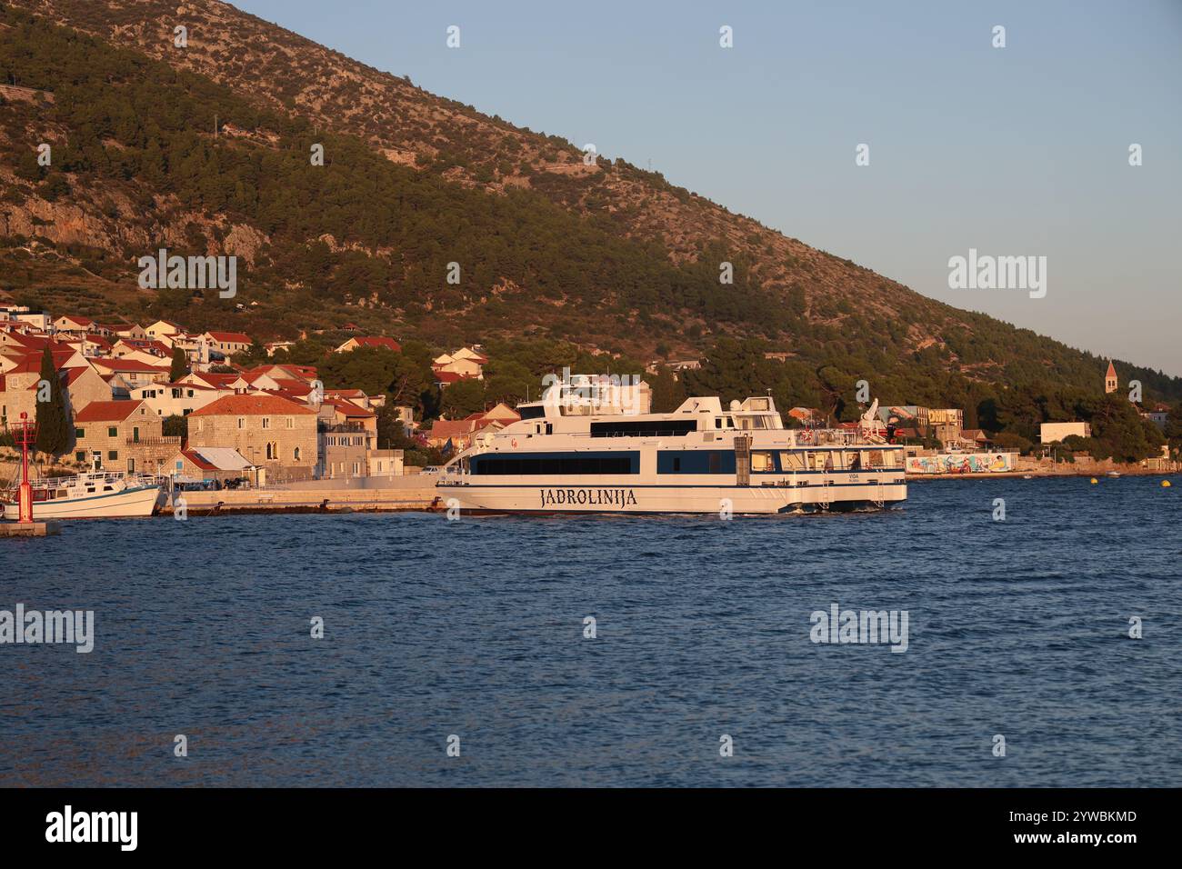 Town of Bol and harbour at sunset, Brac Island, Dalmatia, Croatia ...