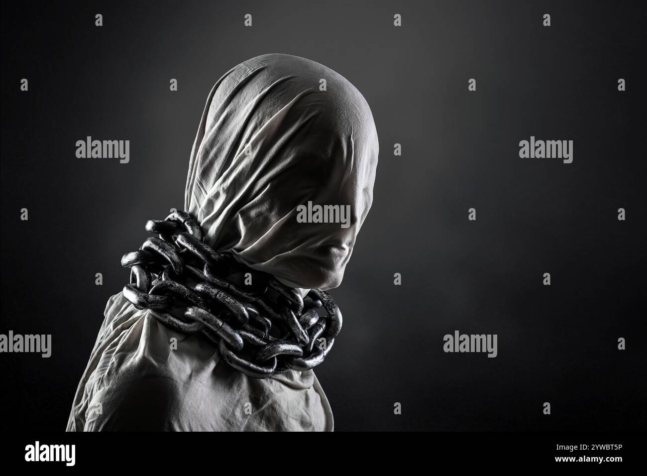 Portrait of a scary ghost with chains over dark misty background Stock ...