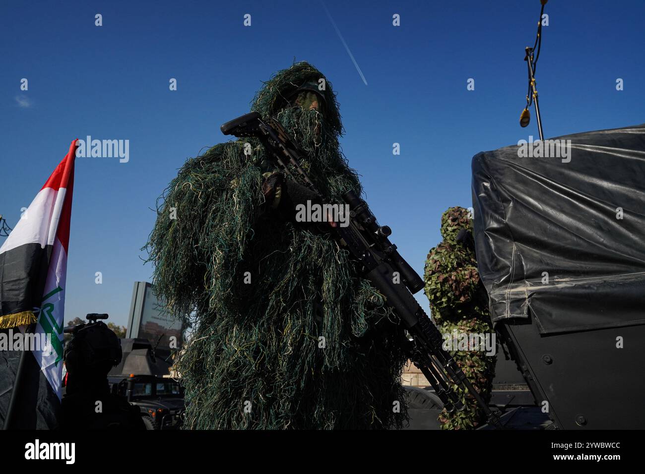 Isis militants on parade hi-res stock photography and images - Alamy