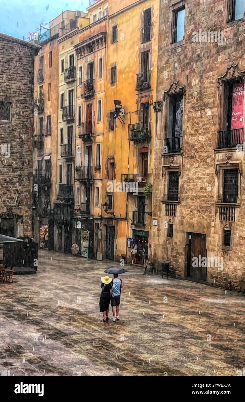A street scene in Barcelona,Spain where a couple walks in the rain ...