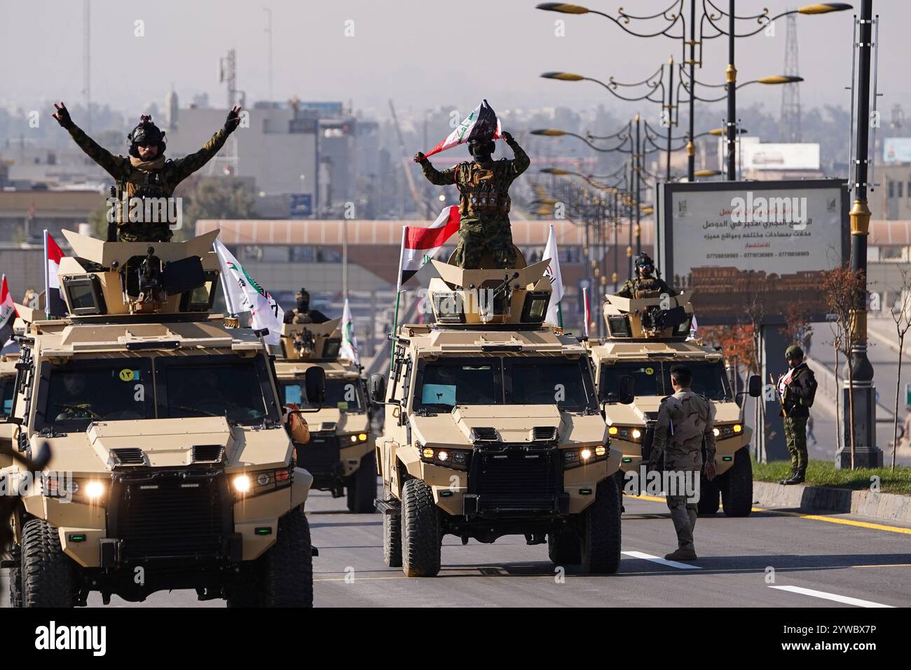 Isis militants parade hi-res stock photography and images - Alamy