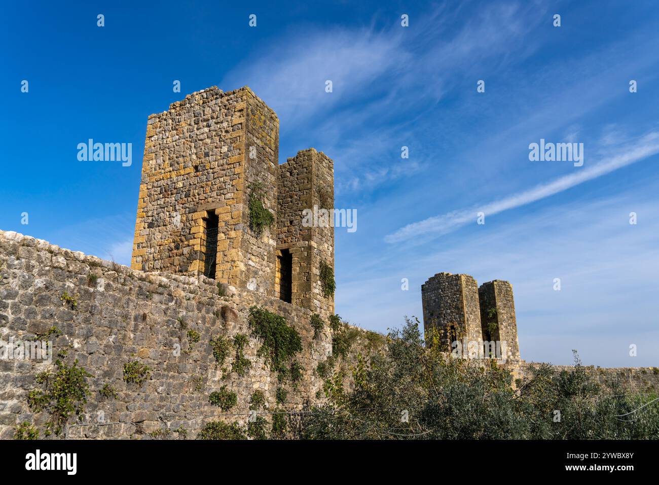 Watchtowers on the city wall of the medieval walled town of ...